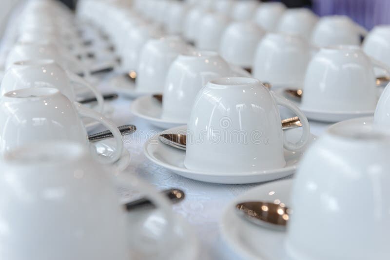 Group of Many Empty Cups with Spoons for Service Coffee or Tea in ...
