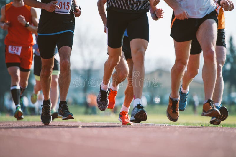 Group of Marathon Racers Runningon the Track Stock Image - Image of ...
