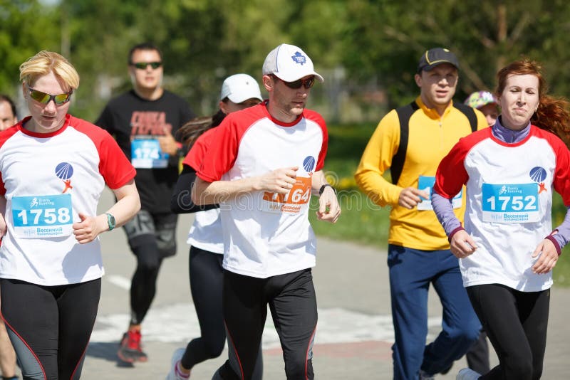 A Group of Marathon Runners Compete at the Spring Half Marathon ...