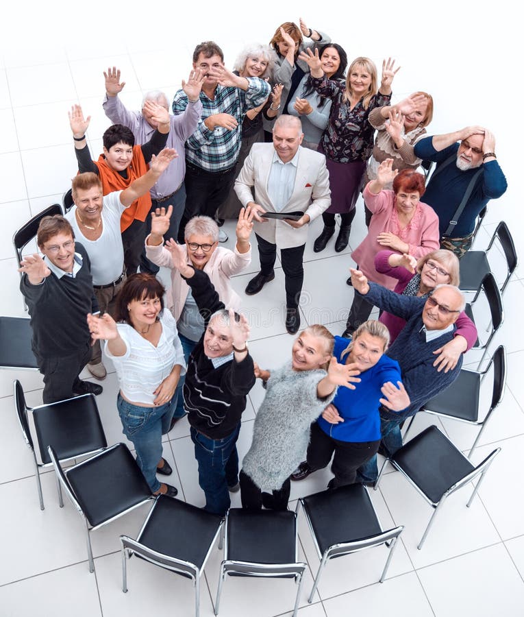 Group of Mature People Applauding at a General Meeting Stock Image ...