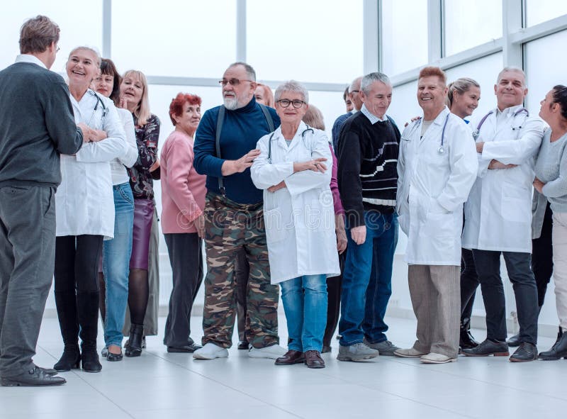 Group of Mature People and Doctors Indoors Full Length Stock Photo ...