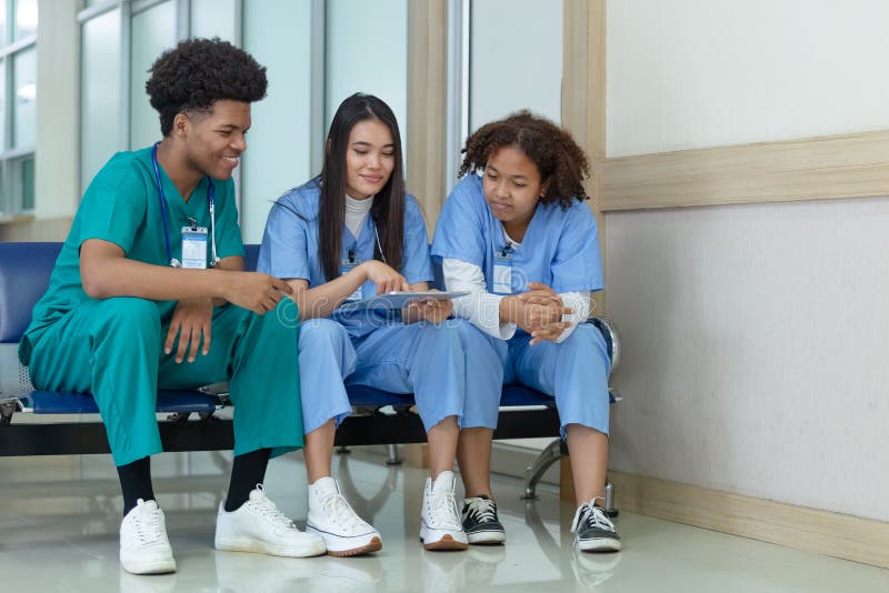 Group of Medical Student Sitting Front Classroom Using Tablet Searching ...