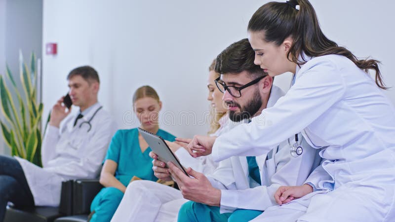 Group of Medical Students and Main Doctor Have a Break Time between the ...