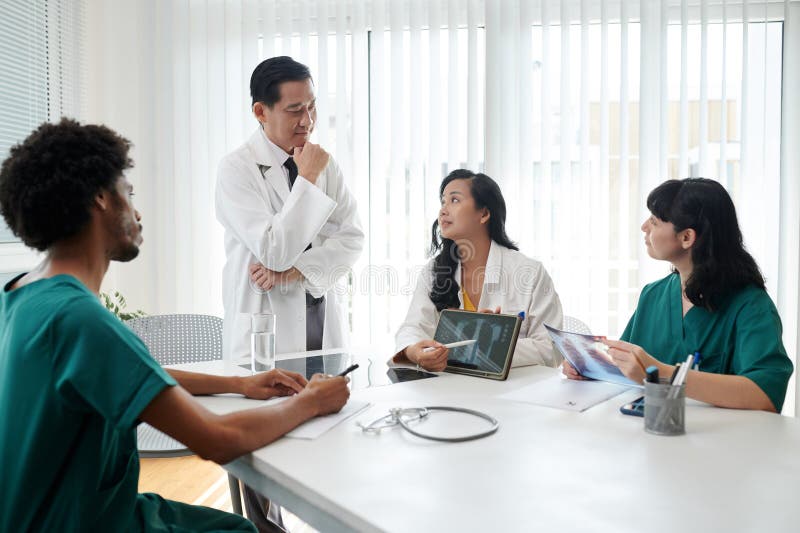 Medical Workers Discussing Difficult Case Stock Image - Image of ...