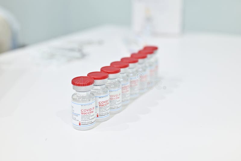 A Group of Medicine Vials for Covid Vaccine on a Solid Background Stock ...