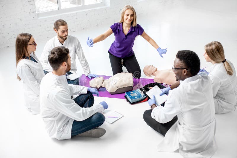 Group of Medics during the First Aid Training Indoors Stock Photo ...