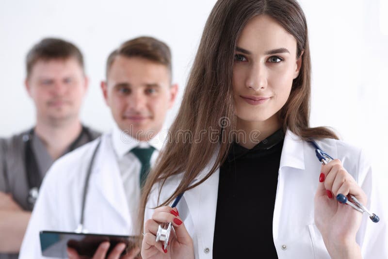 Group of Medics Proudly Posing in Row and Stock Image - Image of doctor ...