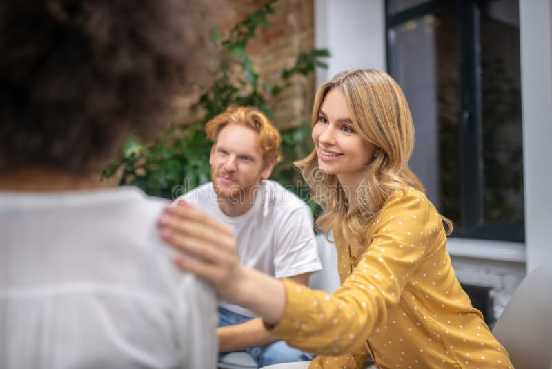 Group Members Supporting Each Other and Looking Friendly Stock Image ...