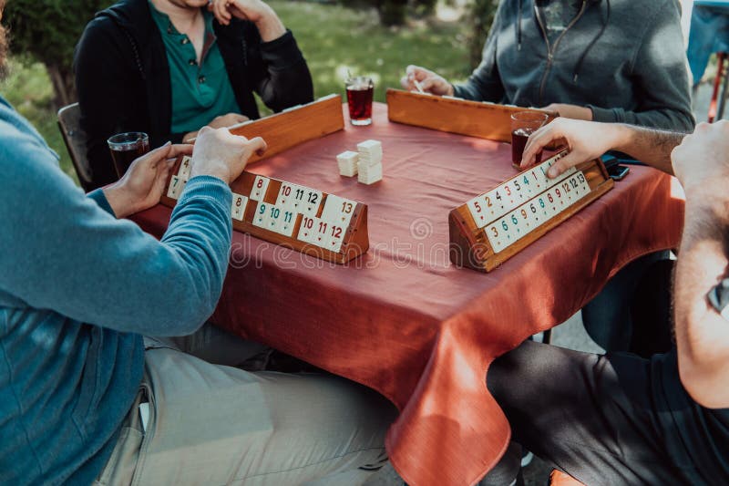 A Group of Men Drink Traditional Turkish Tea and Play a Turkish Game ...