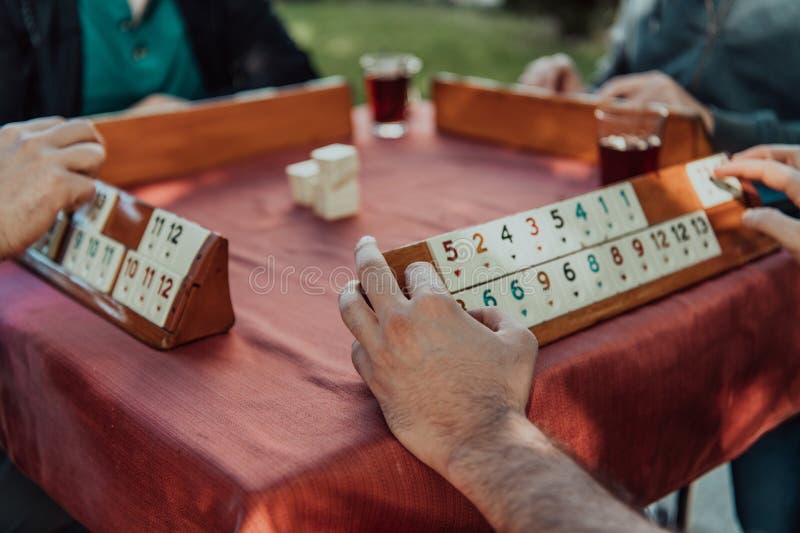A Group of Men Drink Traditional Turkish Tea and Play a Turkish Game ...