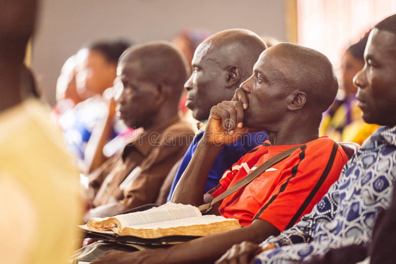 Men sitting in a row editorial photography. Image of friendship - 347916882