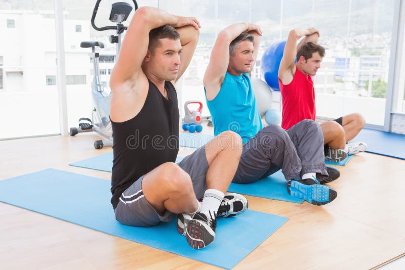 Group of Men Working on Exercise Mat Stock Image - Image of care ...