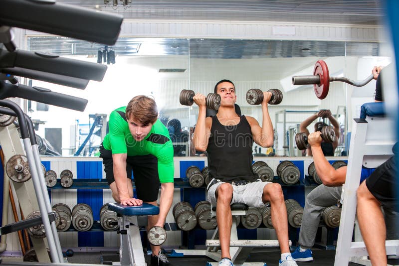 Group of Men Working at the Gym. Stock Image - Image of bodybuilder ...