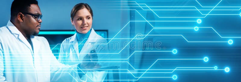 Group of Microelectronic Engineers Discussing in a Modern ...