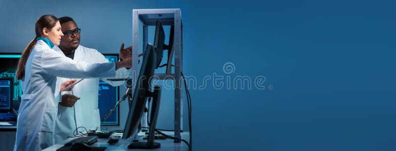 Group of Microelectronic Engineers Discussing in a Modern ...