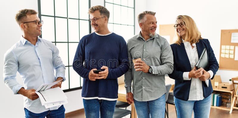 Group of Middle Age Business Workers Smiling Happy Standing at the ...