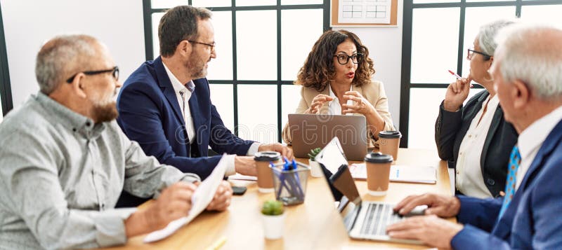 Group of Middle Age Business Workers Smiling Happy Working at the ...
