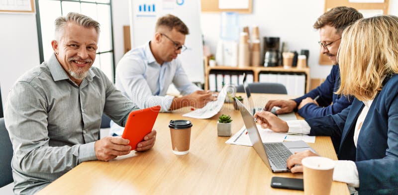 Group of Middle Age Business Workers Working Stock Image - Image of ...