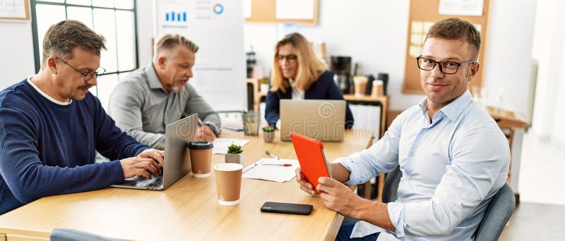 Group of Middle Age Business Workers Working Stock Photo - Image of ...