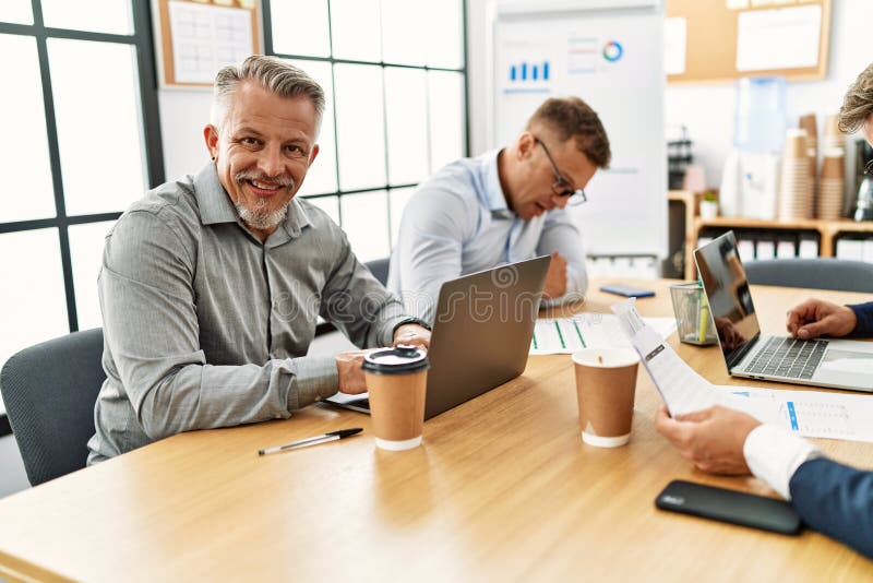 Group of Middle Age Business Workers Working Stock Image - Image of ...