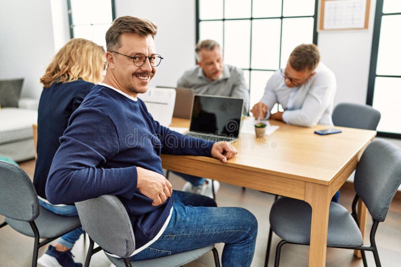 Group of Middle Age Business Workers Working Stock Photo - Image of ...