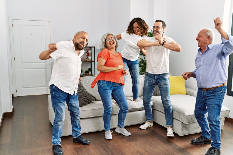 Group of Middle Age Friends Having Party Dancing at Home Stock Photo ...