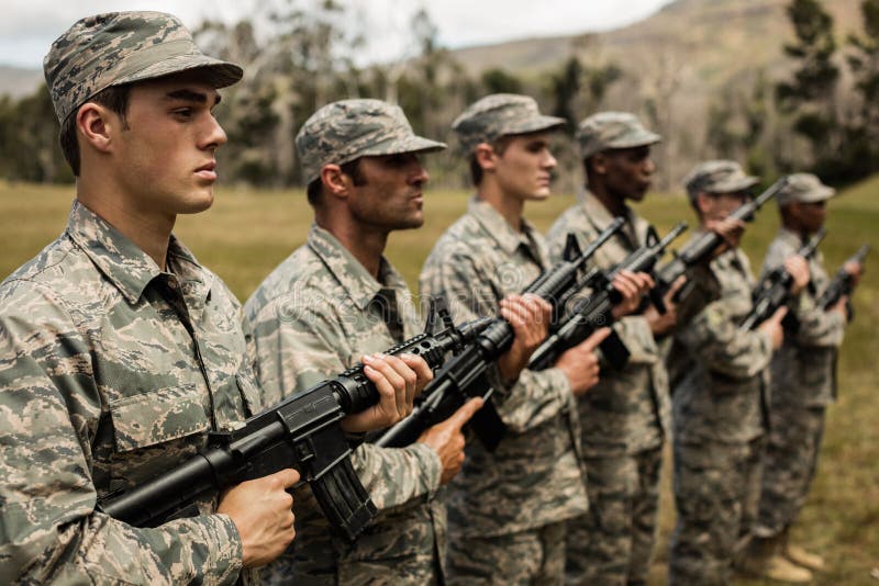 Group of Military Soldiers Standing with Rifles Stock Image - Image of ...