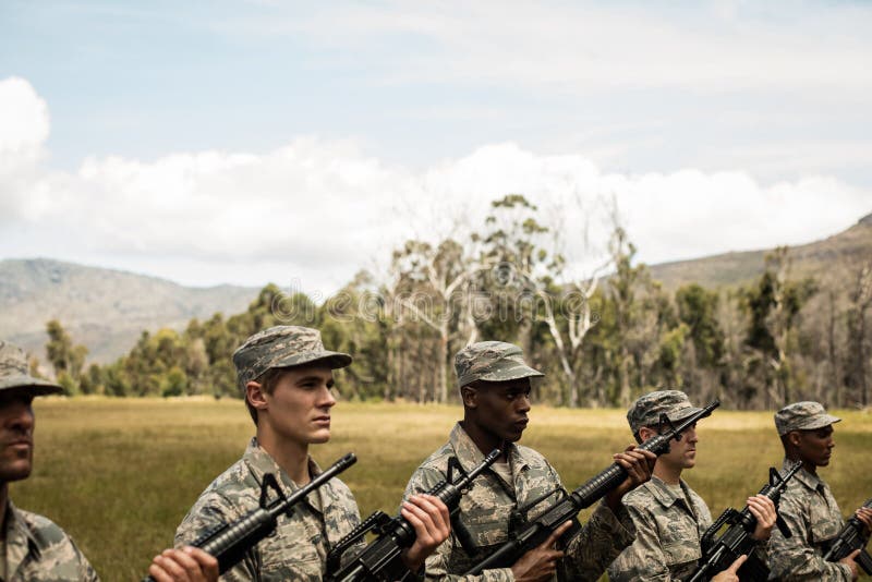 Group of Military Soldiers Standing with Rifles Stock Photo - Image of ...