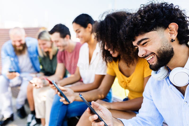 Group of Young People Using Mobile Phone in City Street Stock Photo ... Group of Young People Using Mobile Phone in City Street Stock Photo ...