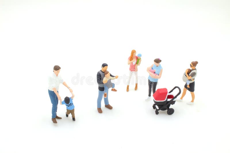 A Group of Mini Figure Mother and Father Gathering Stock Photo - Image ...
