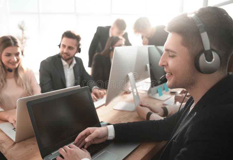 Group of Mobile Cellular Operators Sitting at a Desk Stock Image ...