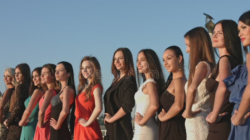Group of Models Posing for the Photographer on the Street Stock Video ...