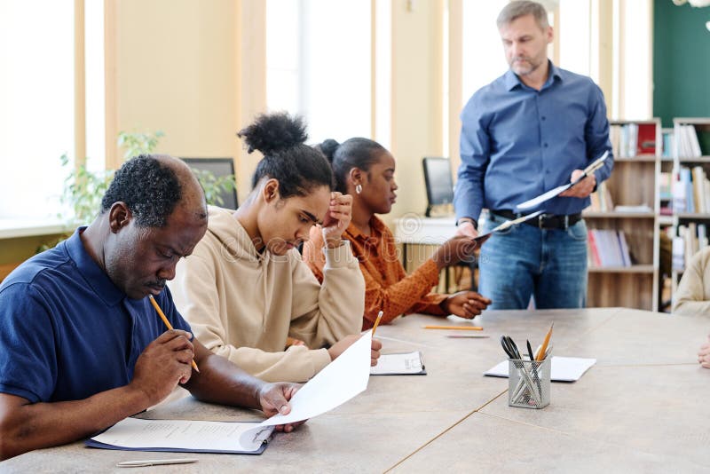 Migrants Doing Language Test Stock Image - Image of young, class: 248094251