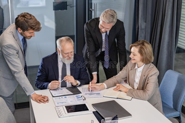 Group of Modern People Using Modern Technologies while Working in the ...