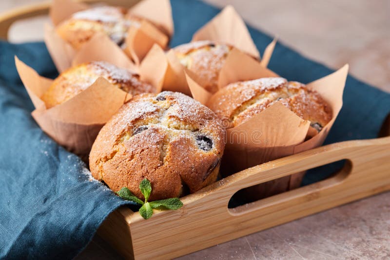 A Group of Muffins with Berries and Chocolate on a Tray. Stock Image ...