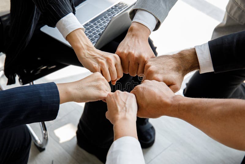 Group of Multi Colors Hands Stack Together and Smiling in the Symbol of ...