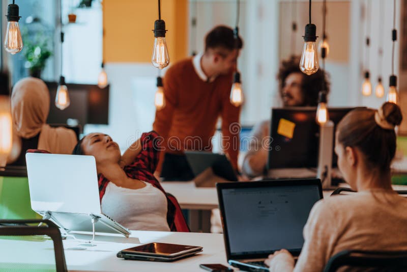 Group of Multi-ethnic Colleagues Working on Desktop Computers, Laptop ...