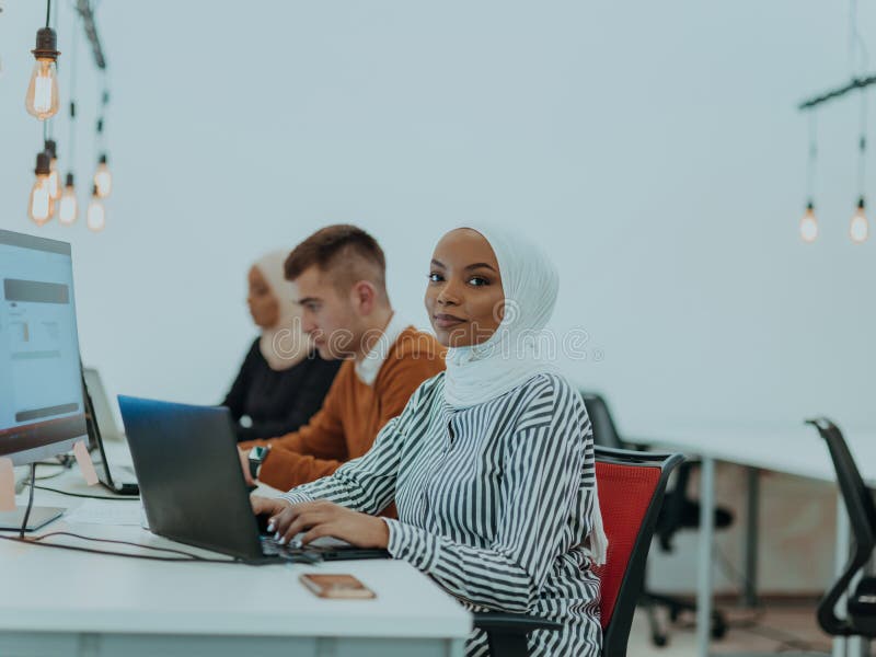 Group of Multi-ethnic Colleagues Working on Desktop Computers, Laptop ...