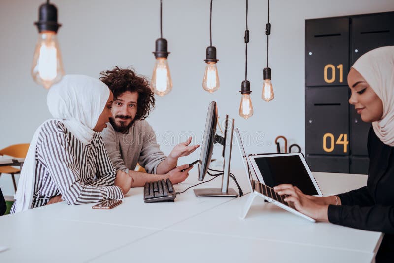 Group of Multi-ethnic Colleagues Working on Desktop Computers, Laptop ...