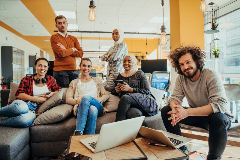 Group of Multi-ethnic Colleagues Working on Desktop Computers, Laptop ...