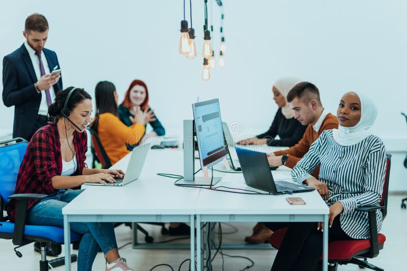 Group of Multi-ethnic Colleagues Working on Desktop Computers, Laptop ...