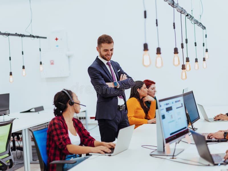 Group of Multi-ethnic Colleagues Working on Desktop Computers, Laptop ...
