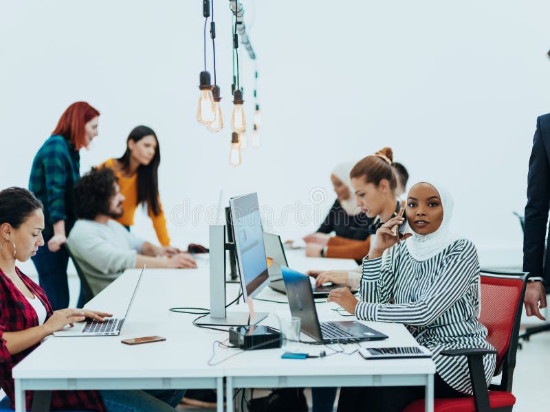Group of Multi-ethnic Colleagues Working on Desktop Computers, Laptop ...