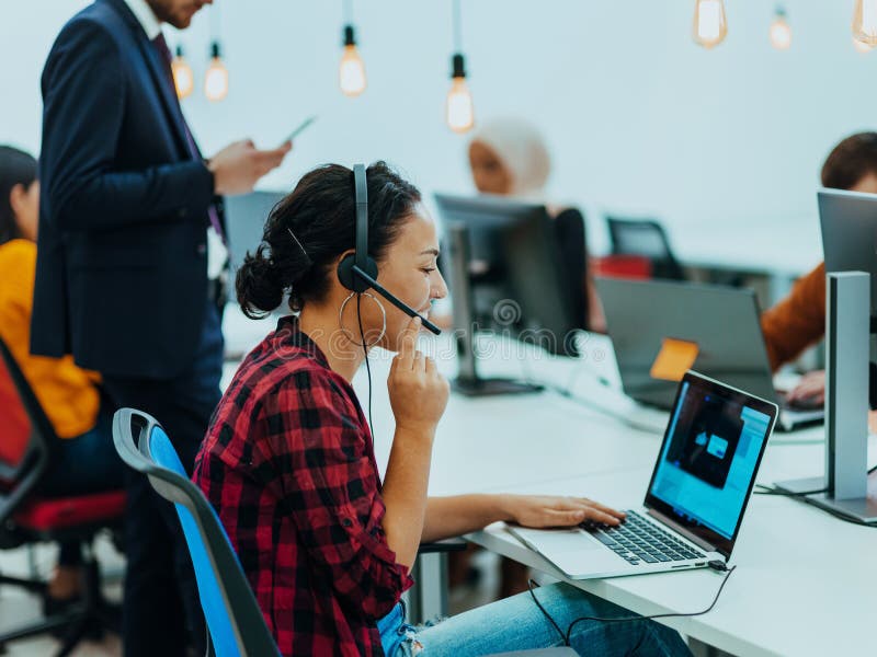 Group of Multi-ethnic Colleagues Working on Desktop Computers, Laptop ...