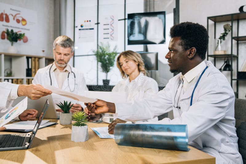 Group of Multi Ethnic Doctors Having International Training Stock Photo ...
