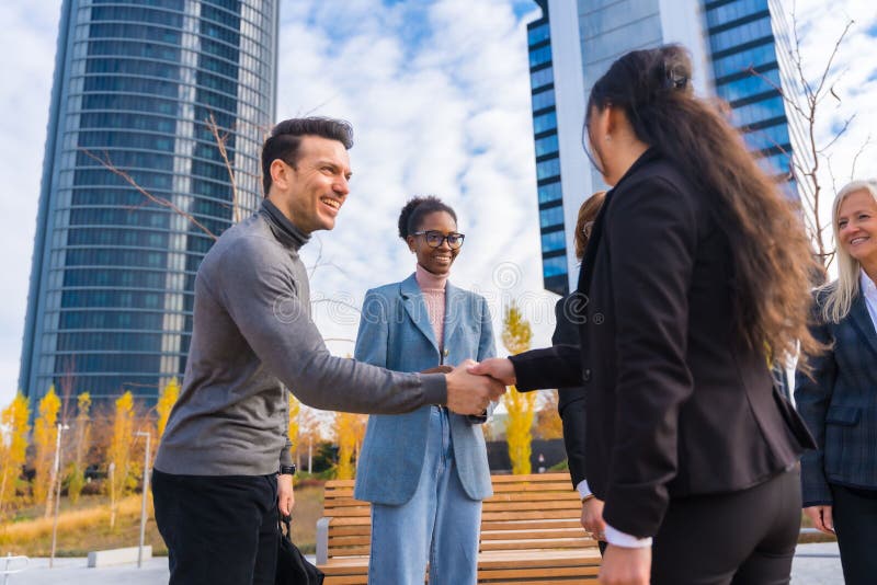 Group of Multi-ethnic Fellow Businessmen or Executives Introducing Each ...