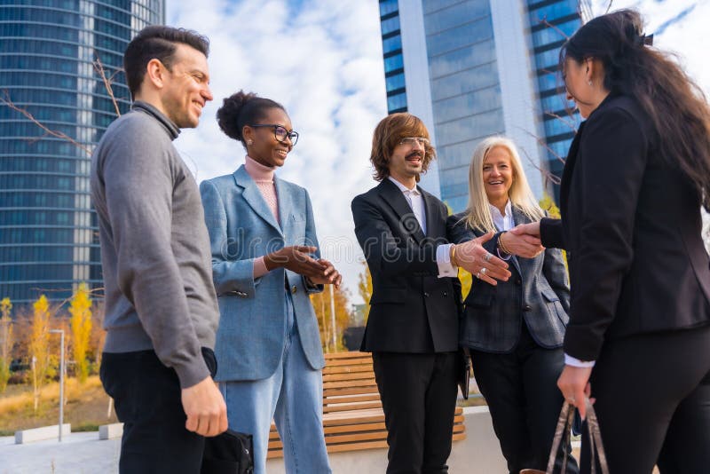 Group of Multi-ethnic Fellow Businessmen or Executives Introducing Each ...