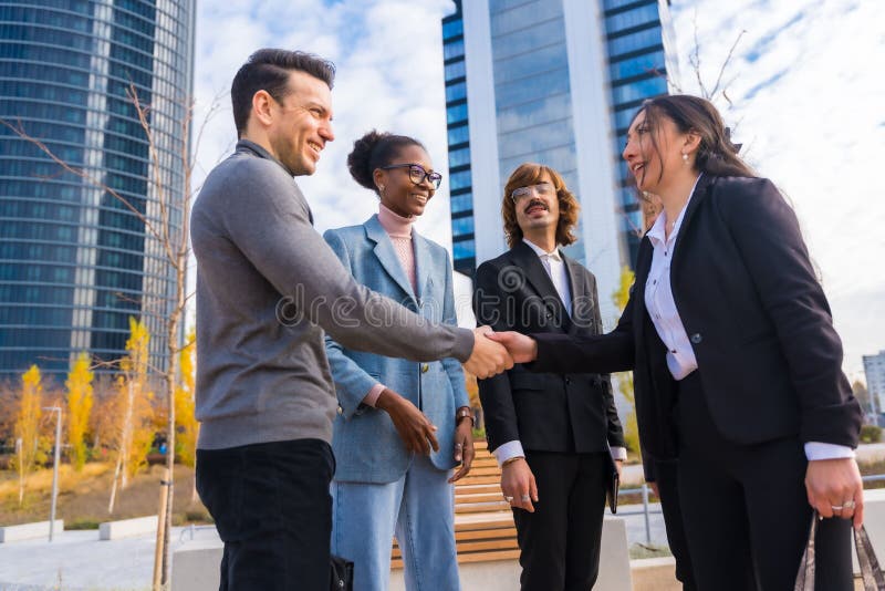 Group of Multi-ethnic Fellow Businessmen or Executives Introducing Each ...