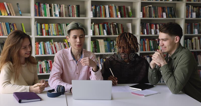 Group of Multi Ethnic Students Studying Together in University Library Stock Video - Video of ...