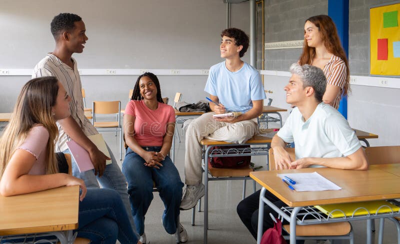 Group of Multi-ethnic Students Talking in Class during a Break. High ...
